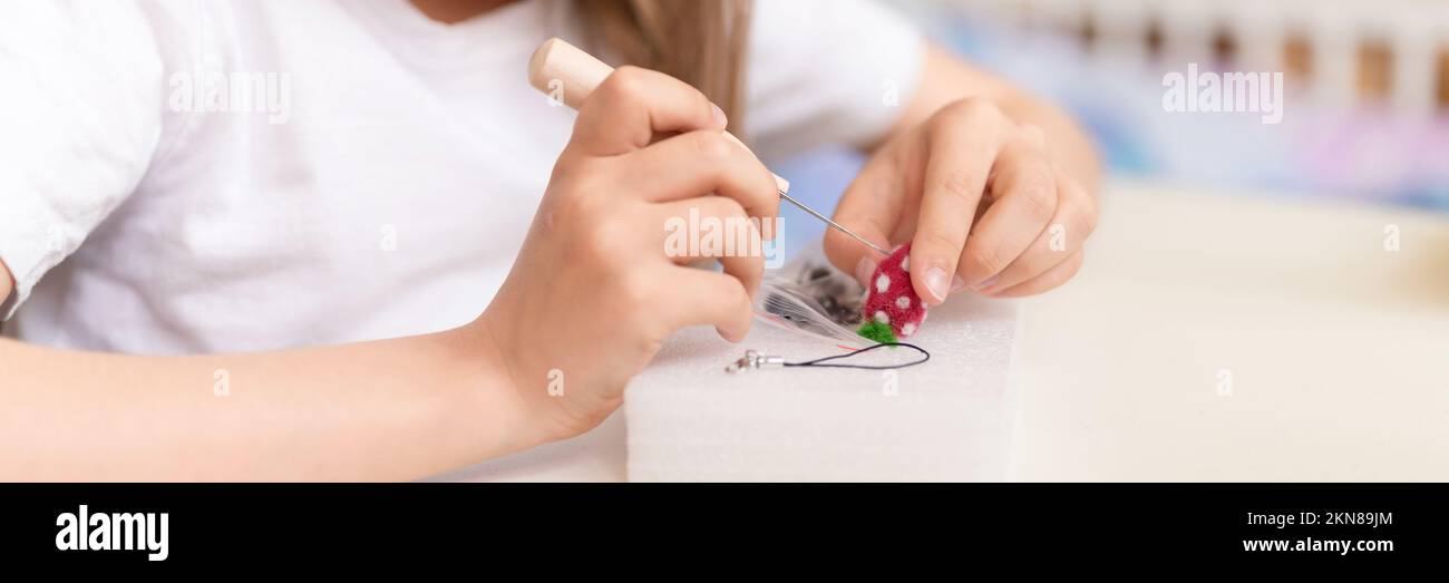 felt wool craft by handmade with needle. little kid girl artisan nine ...