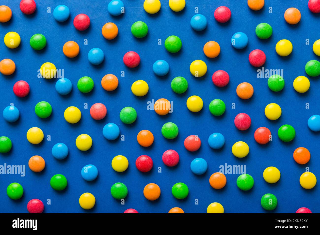 colorful candies as background top view. Seamless pattern with candy ...