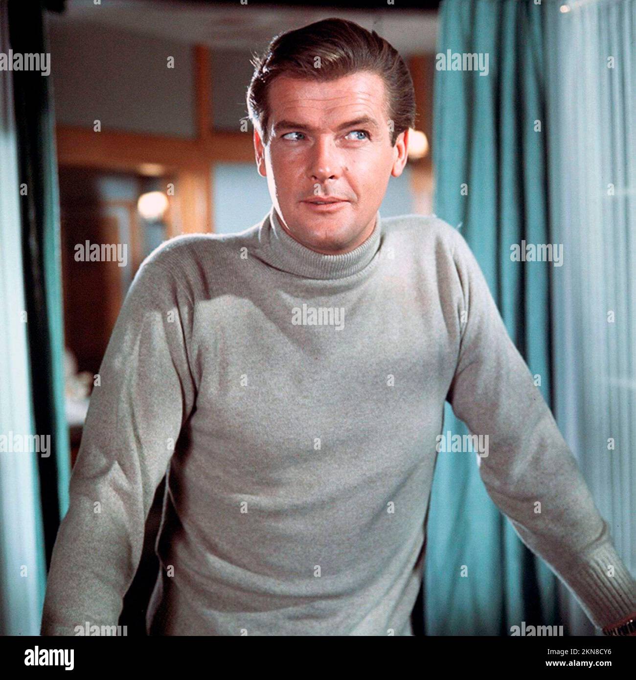 ROGER MOORE in THE SAINT (1962), directed by ROY WARD BAKER and LESLIE NORMAN. Credit: ITC ...