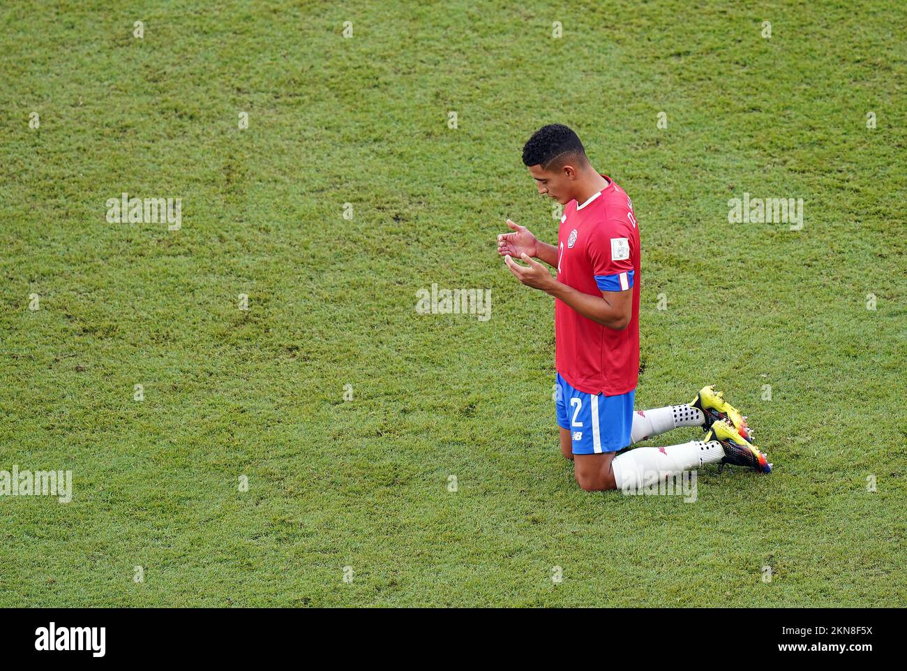 Costa Rica's Daniel Chacon prays on the pitch after the FIFA World Cup ...