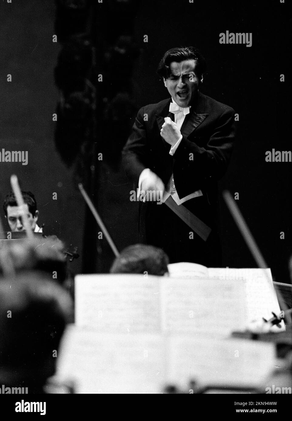Mario Benzecry, Argentina orchestra conductor, during a performance at ...