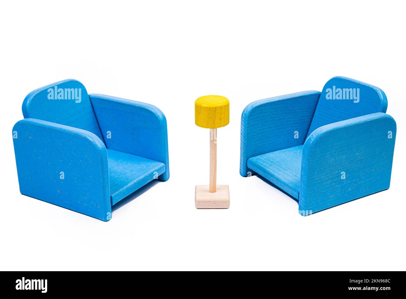 a wooden blue toy chair, a sofa, two chairs with a table, a yellow ...