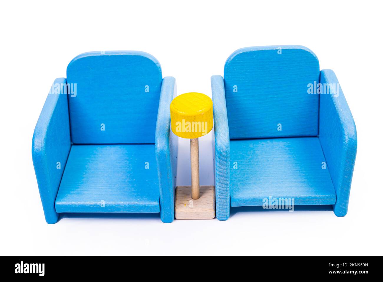 a wooden blue toy chair, a sofa, two chairs with a table, a yellow ...