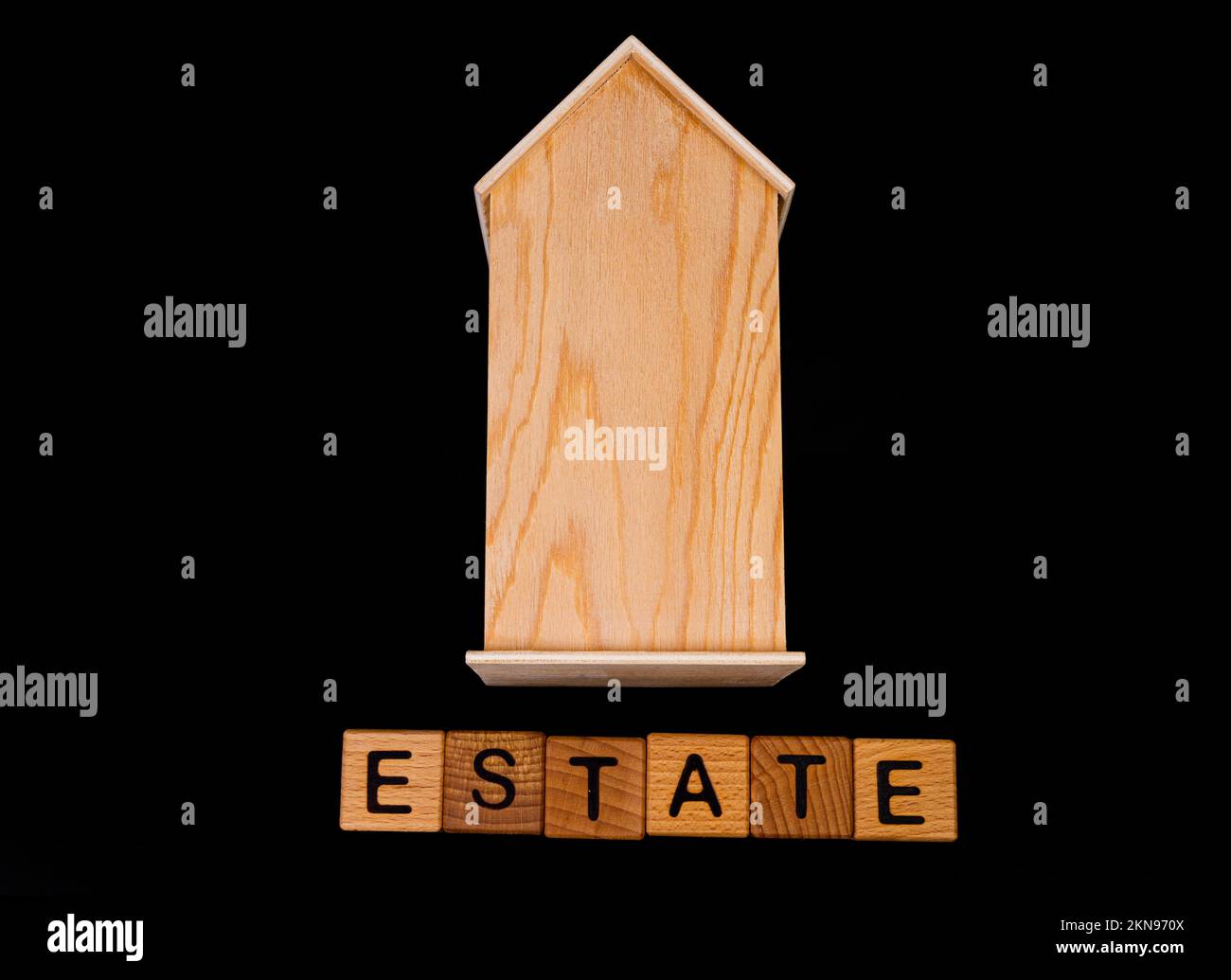 wooden house mockup with house keys, wooden cubes with words rent sale ...