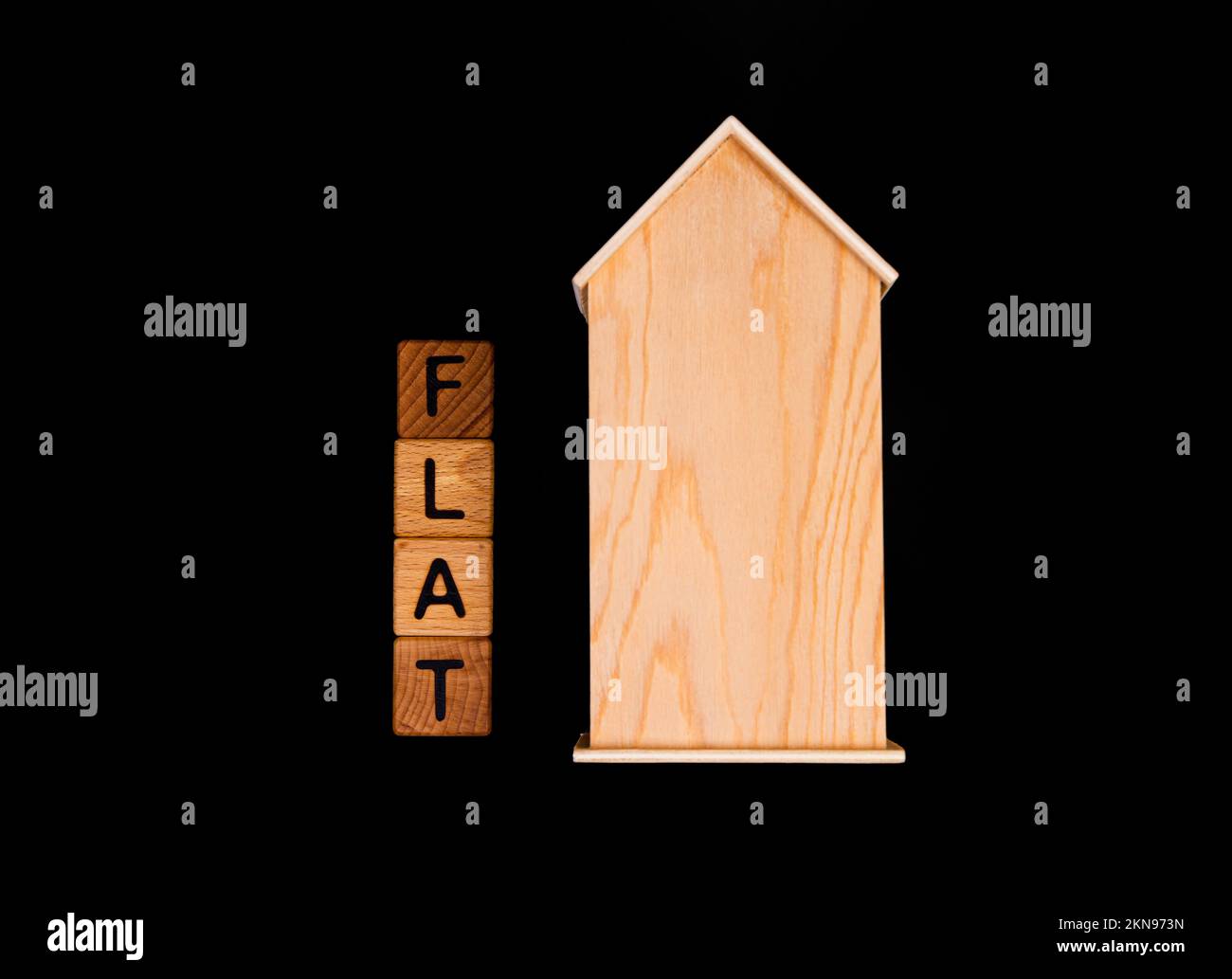 wooden house mockup with house keys, wooden cubes with words rent sale ...