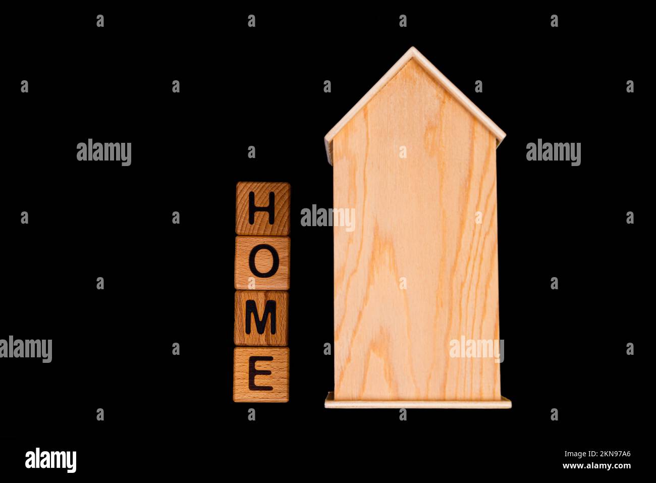 wooden house mockup with house keys, wooden cubes with words rent sale ...