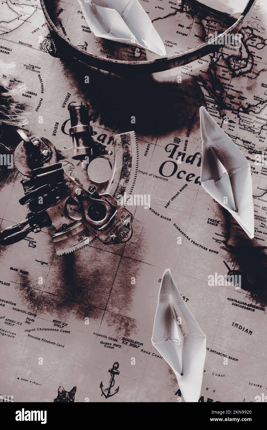 Faded old scene in weathered sailing with navigation equipment on worn ...