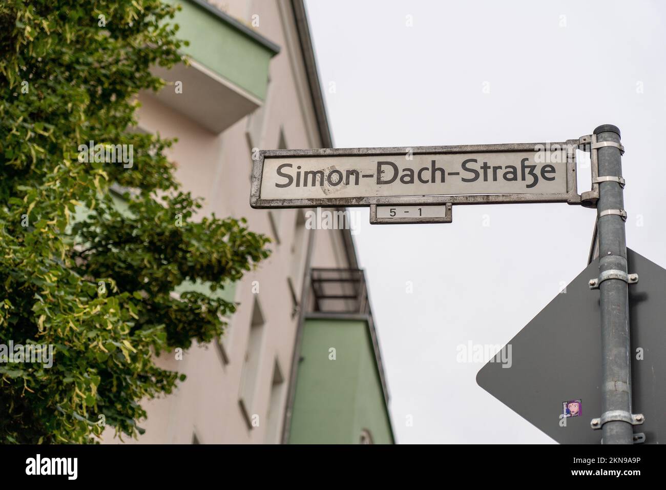 A low-angle shot of the street signs in Berlin, Germany Stock Photo - Alamy