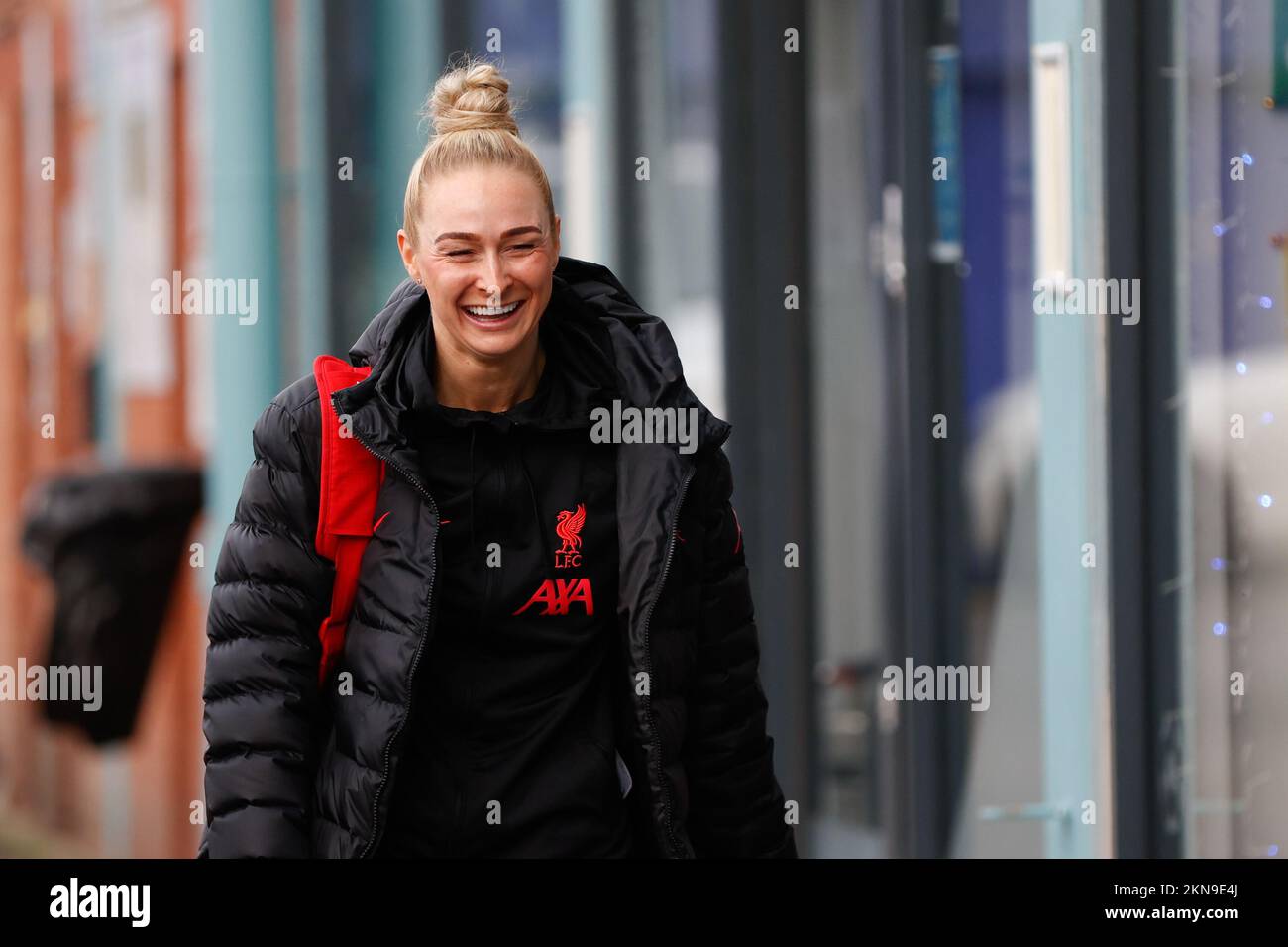 Rhiannon Roberts #4 of Liverpool Women laughs as she arrives before the ...