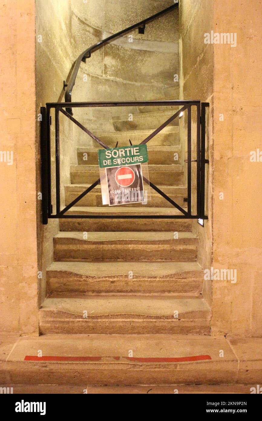 Old stone steps blocked off by iron gate and sign Stock Photo - Alamy