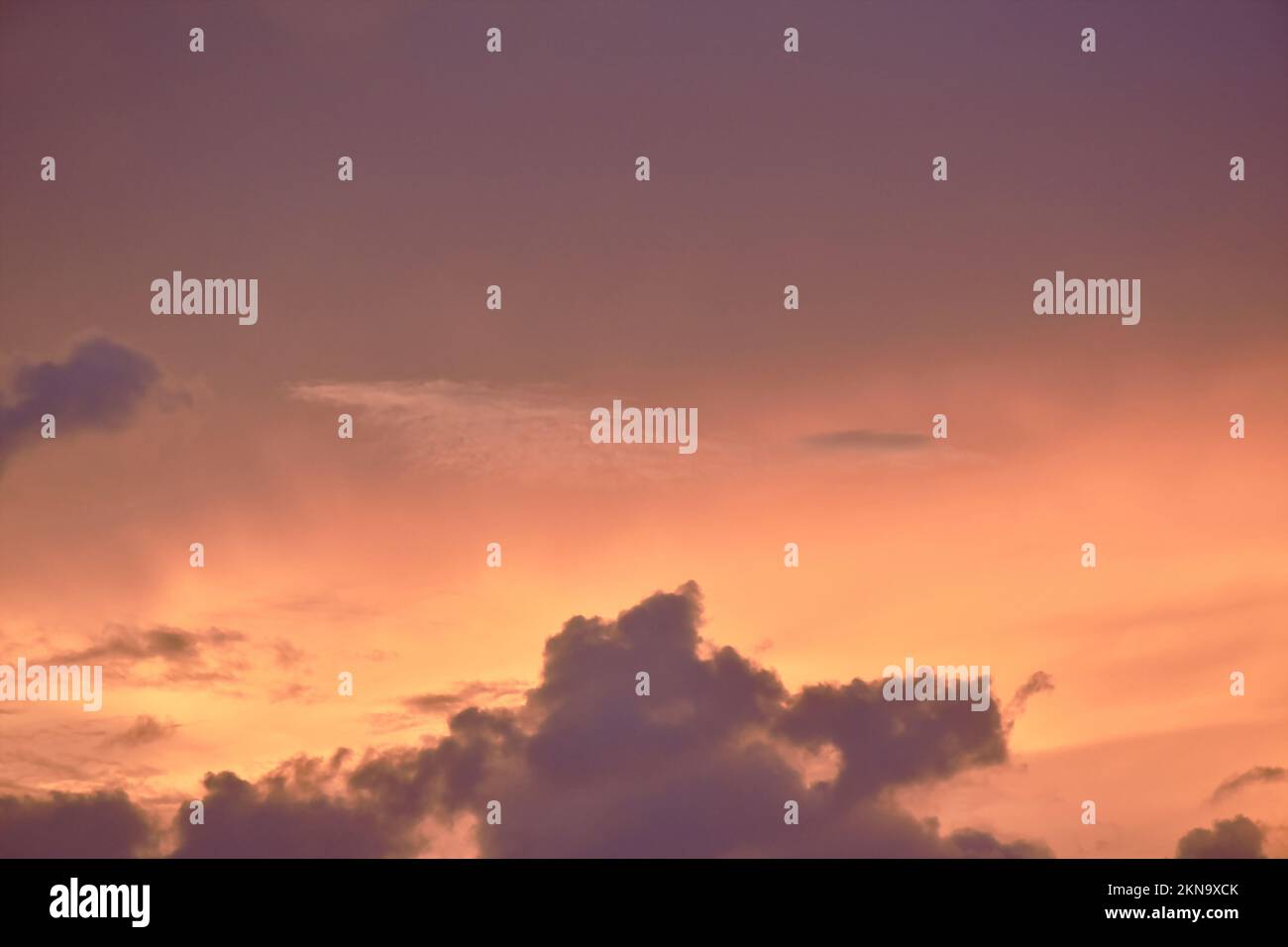 cloud spreading on sunset sky in evening Stock Photo - Alamy