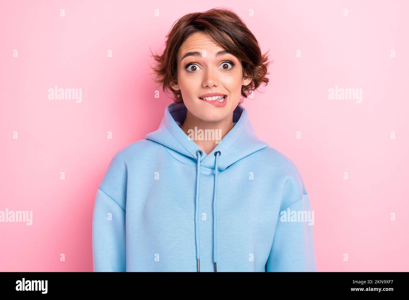 Photo of millennial cute lady bite teeth lips wait holiday birthday ...