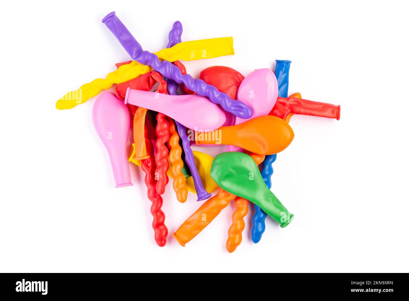 Сolorful deflated balloons. New colorful balloons isolated on white ...