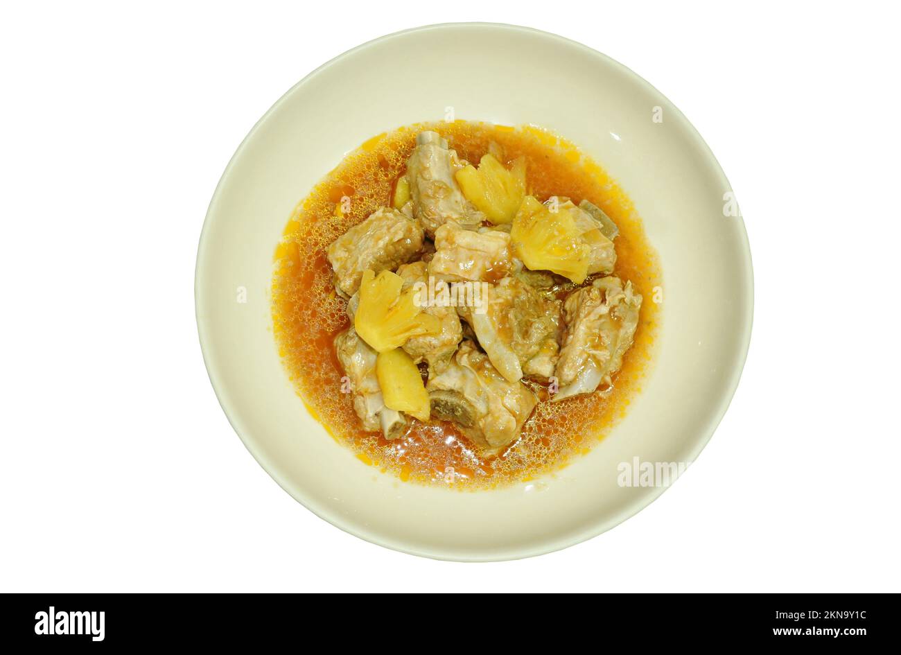 boiled pork bone with slice pineapple and tomato stew on plate Stock ...