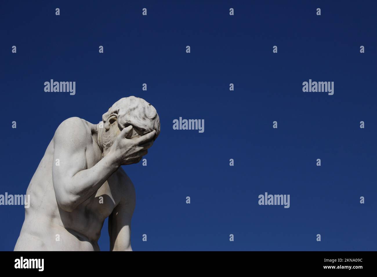Funny face palming statue background with copy space. Concept for ...