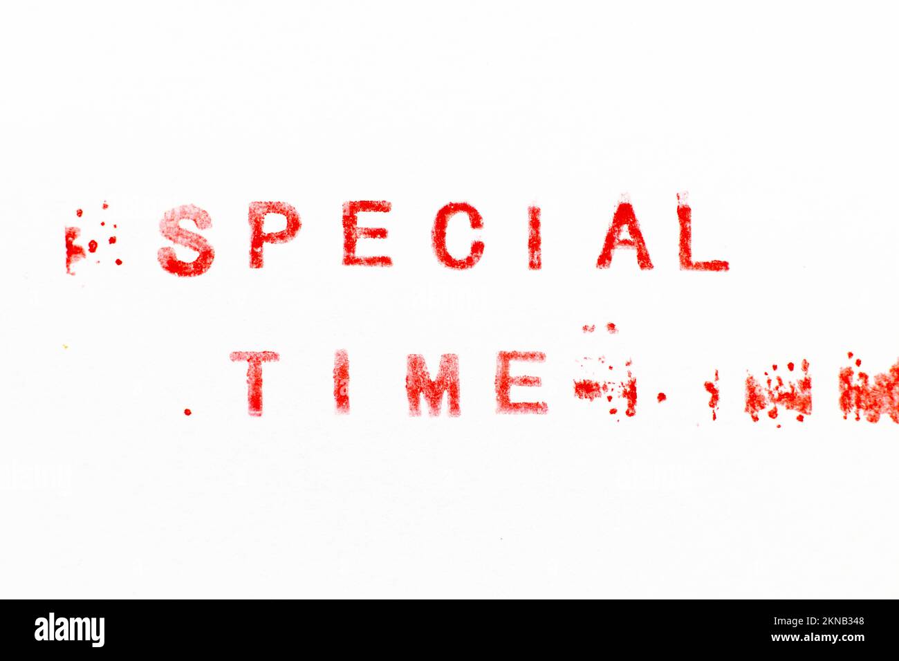 Red color ink rubber stamp in word special time on white paper ...