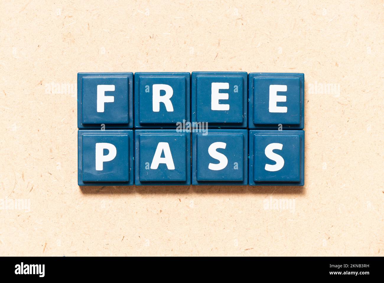 Tile letter in english word free pass on wood background Stock Photo ...