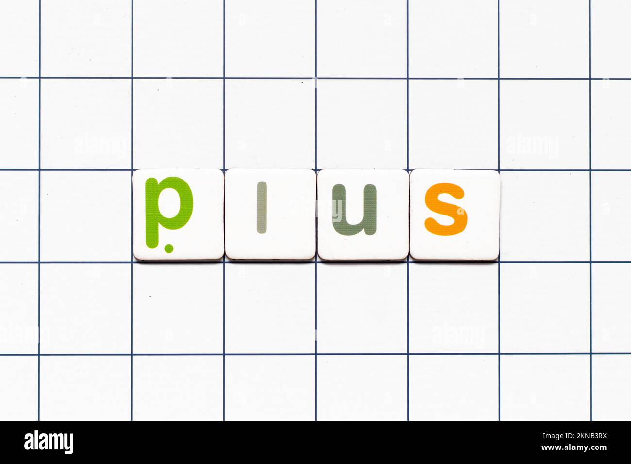 Colorful tile letter in word plus on white grid background Stock Photo ...