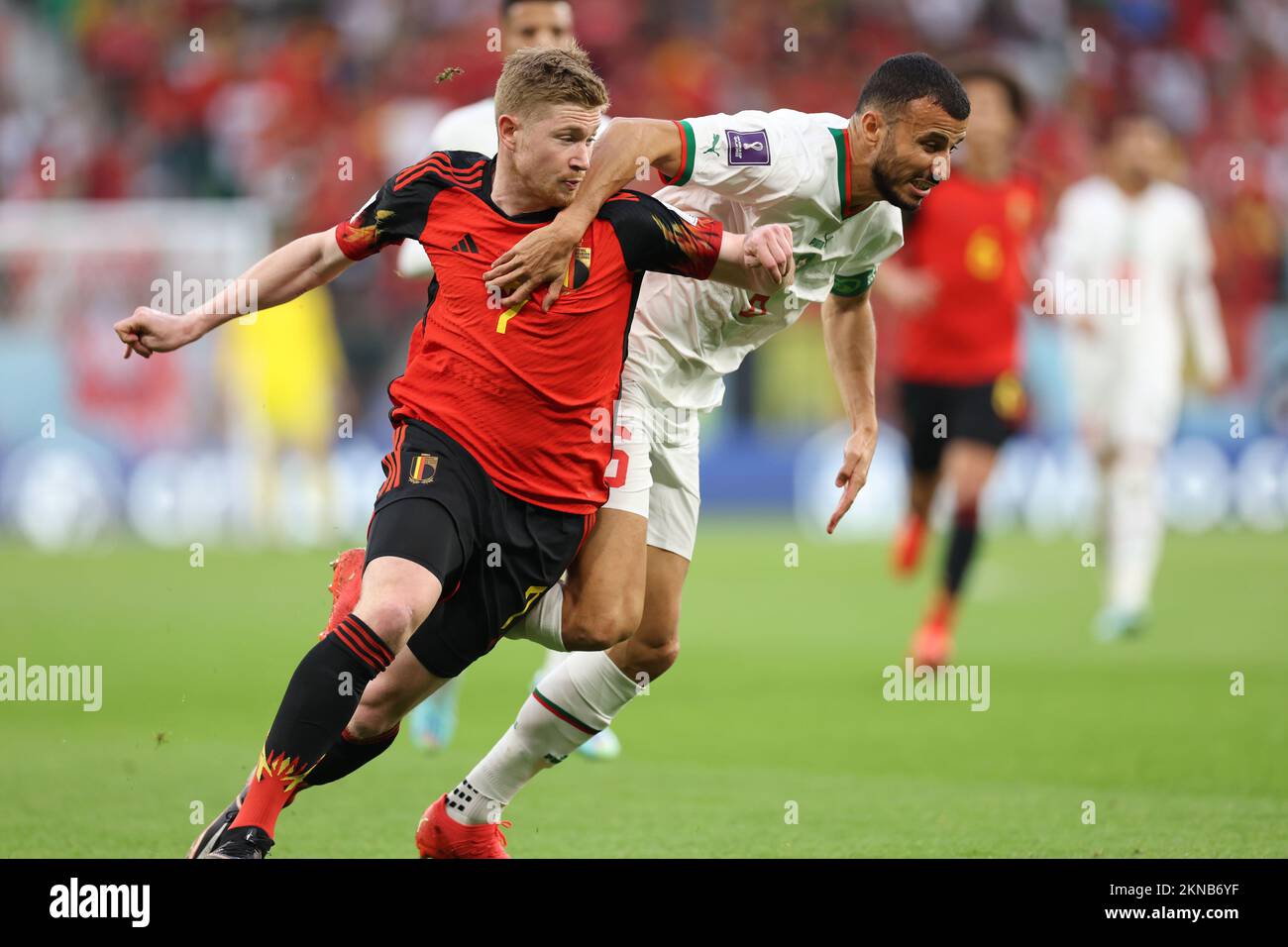 Doha, Qatar. 27th Nov, 2022. Kevin de Bruyne (L) of Belgium vies with ...
