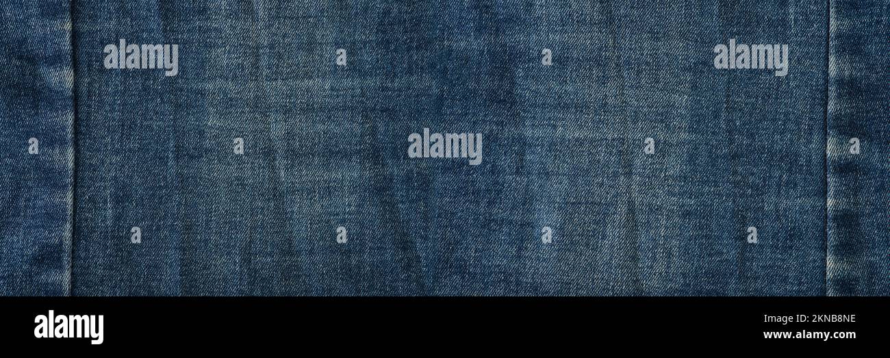Texture of denim close-up. Jeans seam with place for text Stock Photo ...