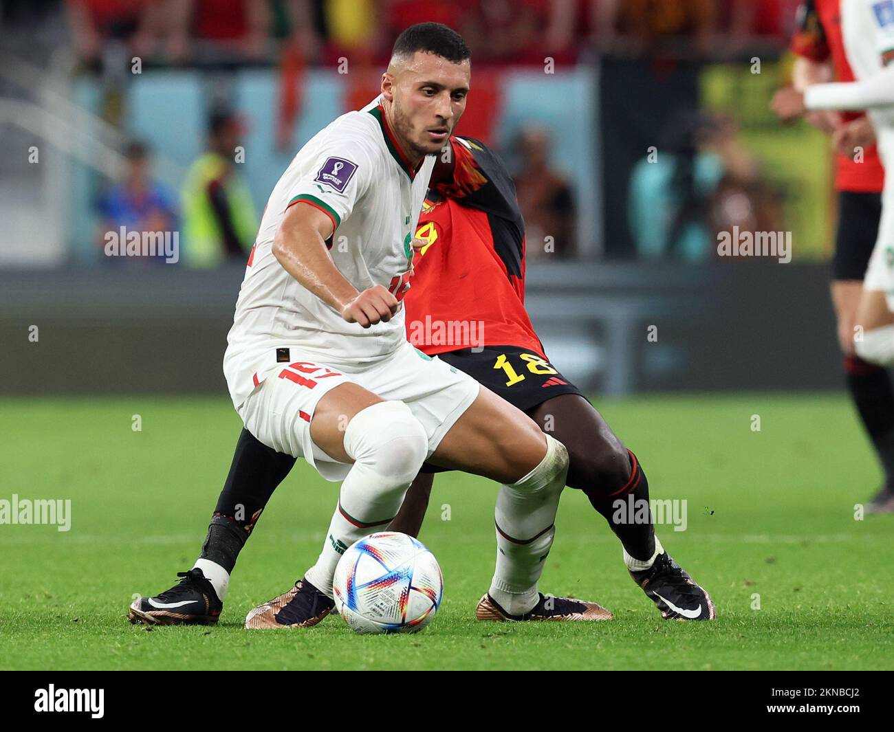 Belgium's Amadou Onana and Moroccan Selim Amallah pictured in action ...