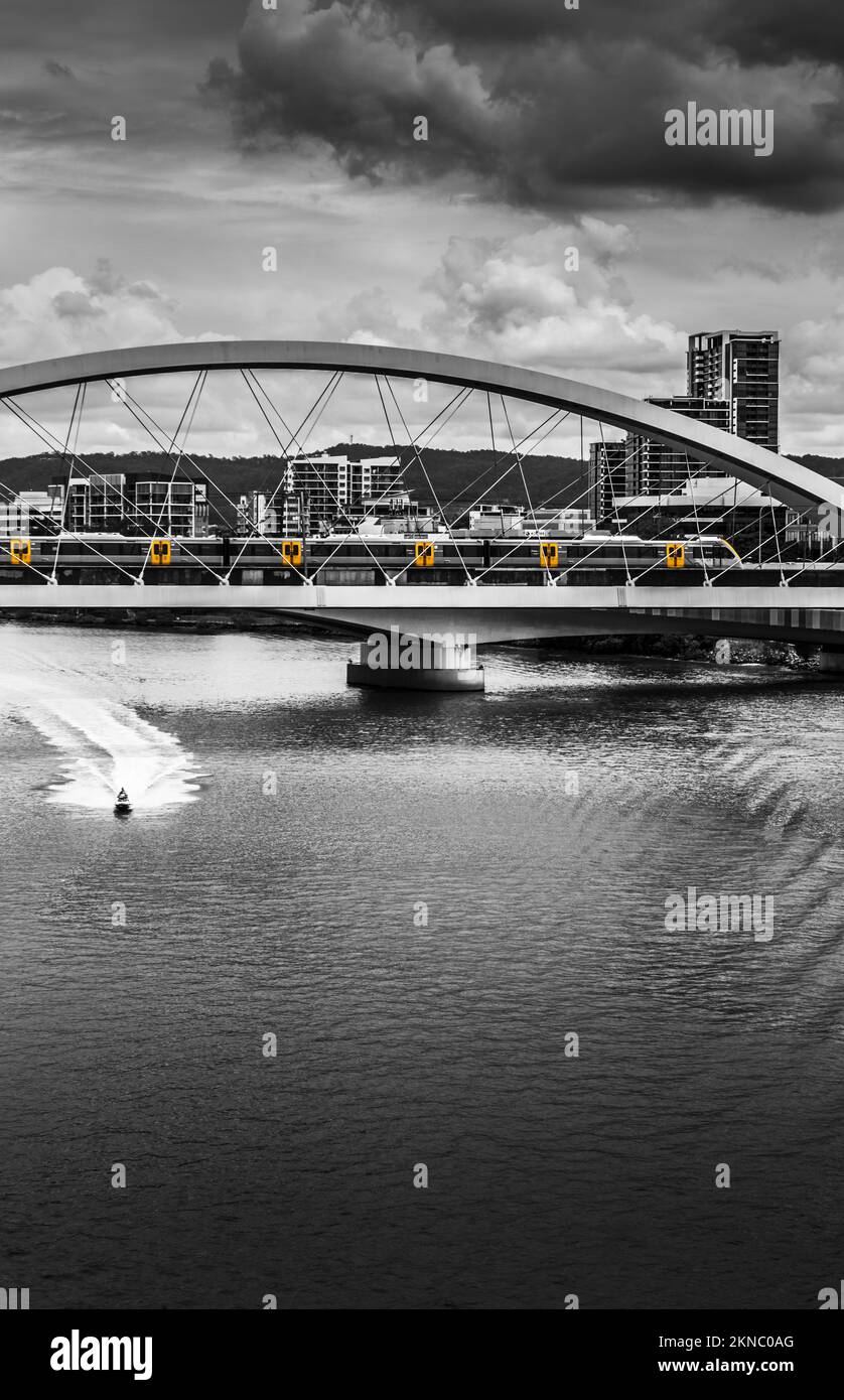 Dramatic river landscape on a railway bridge crossing in black, white ...