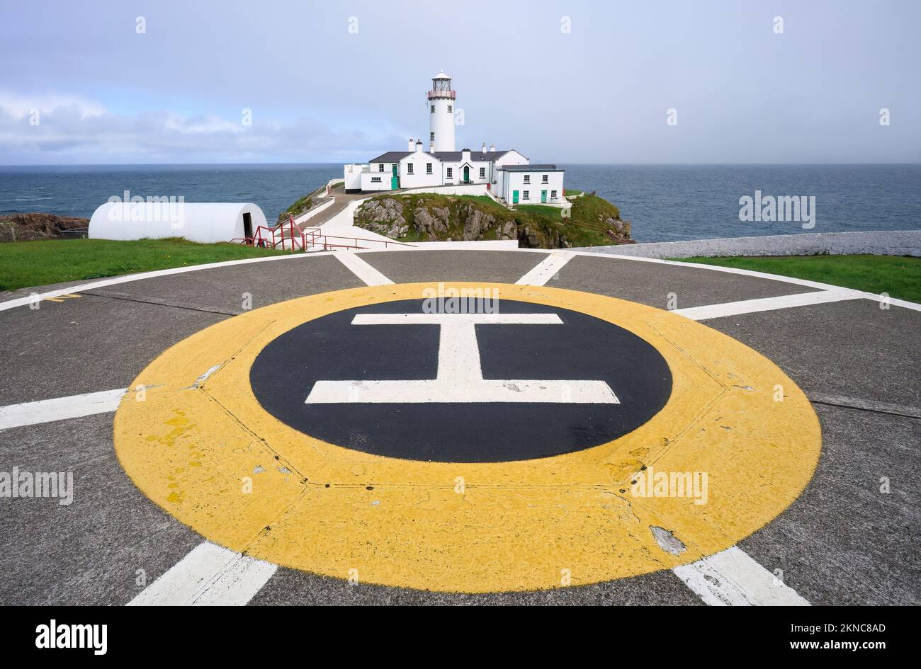 Fanad Head Lighthouse with its rough cliffs in the northern part of ...