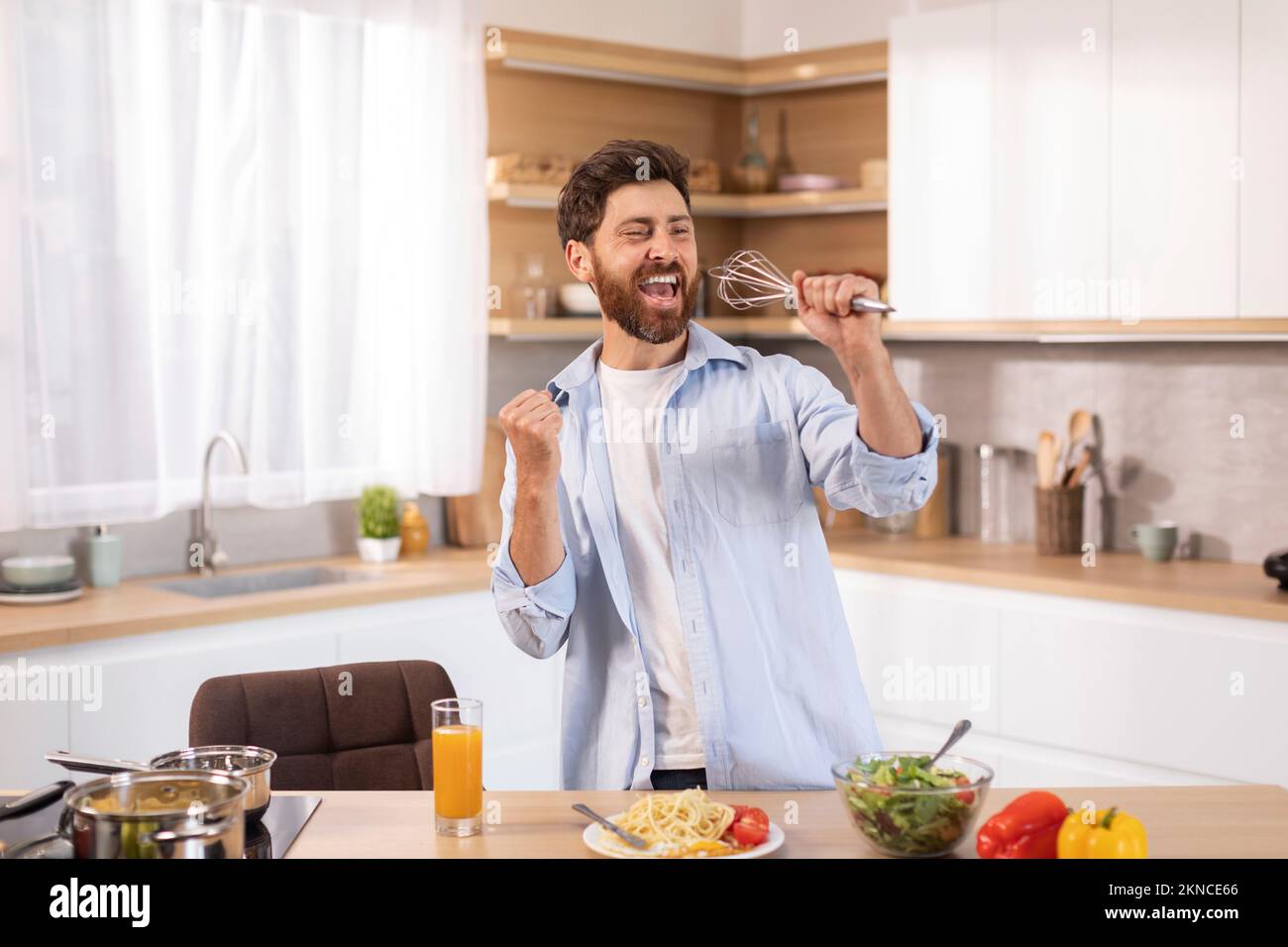 Smiling middle aged caucasian male superstar with beard enjoys free ...