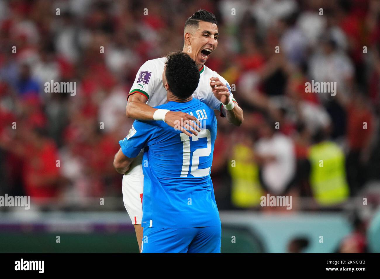 Doha, Qatar. 27th Nov, 2022. Jawad El Yamiq with Munir of Morocco ...