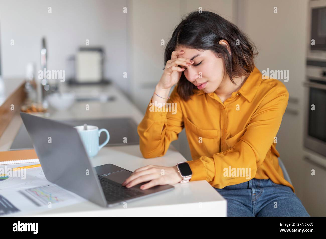 Stressed Arab Female Freelancer Suffering Headache While Working With ...