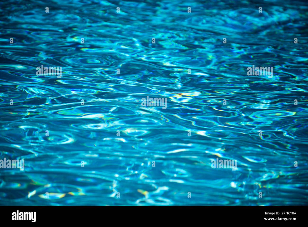 Water background. Blue water, ripples and highlights. Texture of water ...