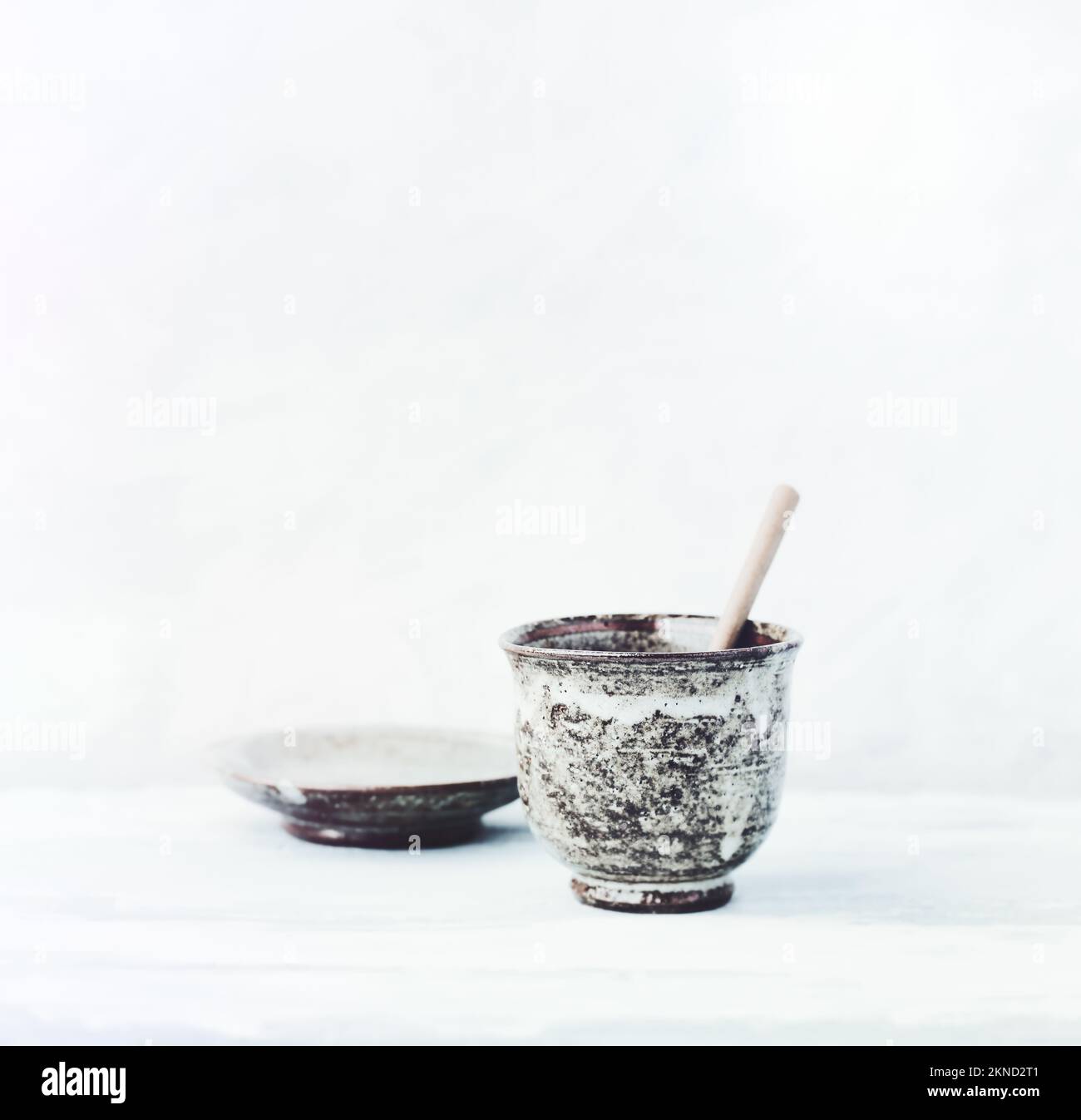 Traditional, handcrafted ceramic on bright wooden background. Soft ...