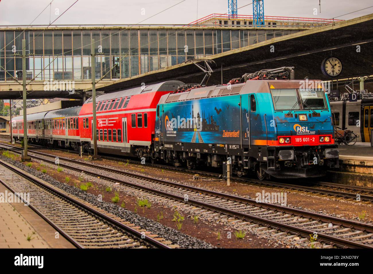 An old train at the train station. Deutsche Bahn Electric Class 185 ...