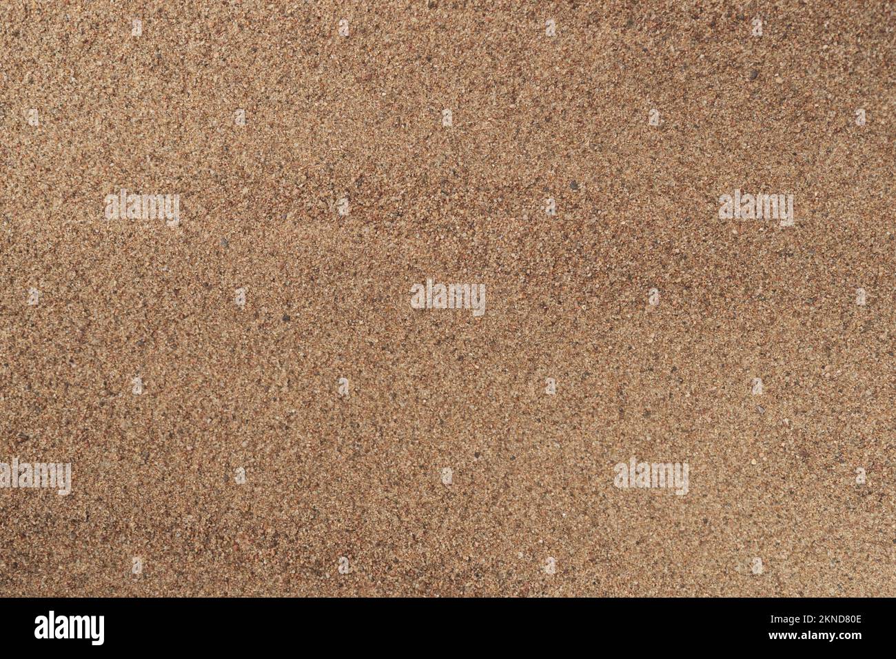 Sand beach background top view, shallow focus Stock Photo - Alamy
