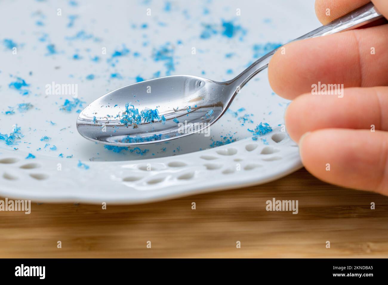 Microplastic in food, Environment and health concept, spoon and plate ...