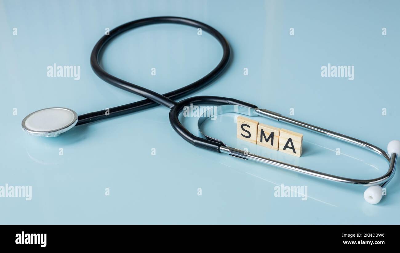 SMA, spinal muscular atrophy, Written on wooden blocks, a rare disease ...