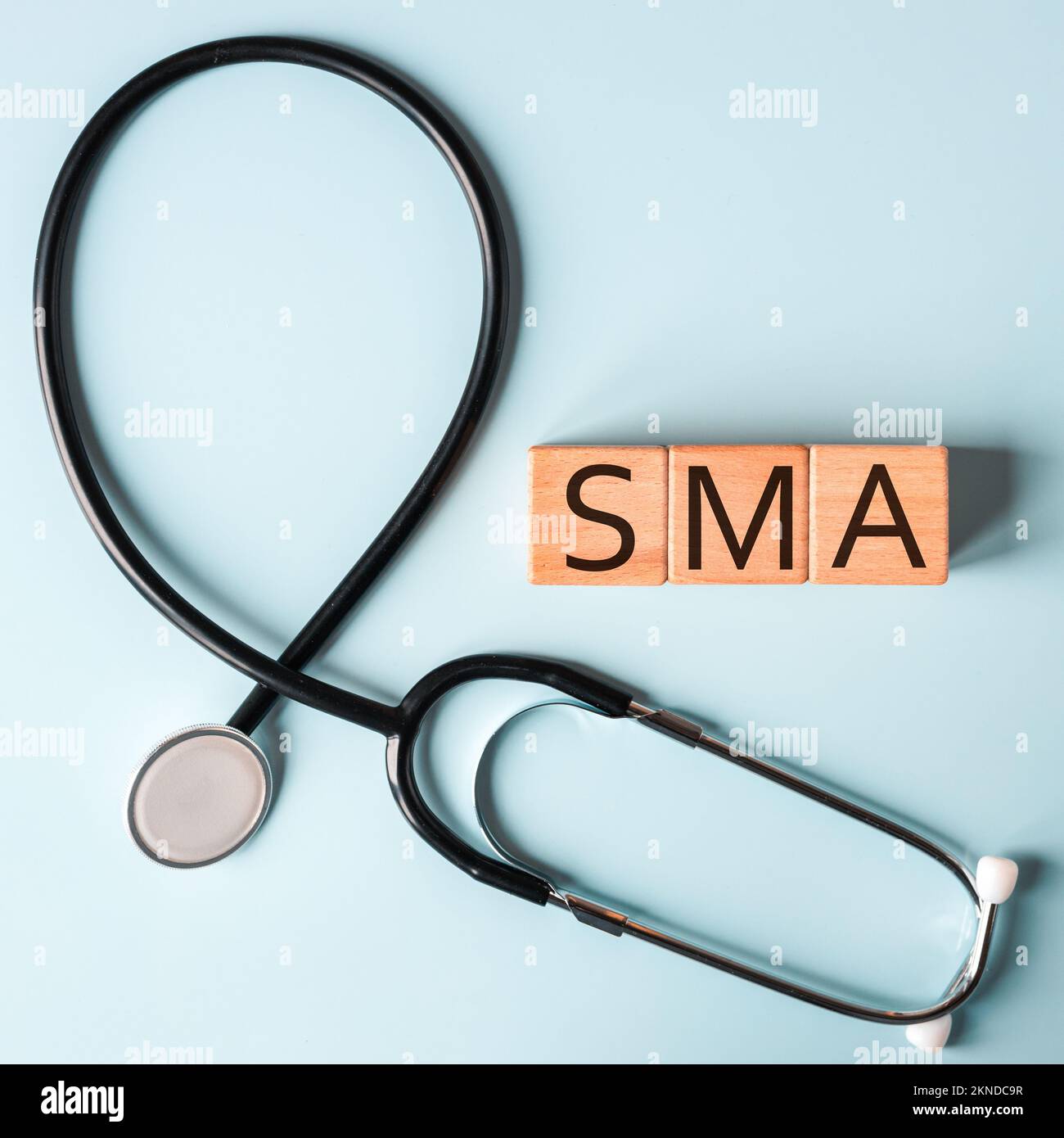 SMA, spinal muscular atrophy, Written on wooden blocks, a rare disease ...