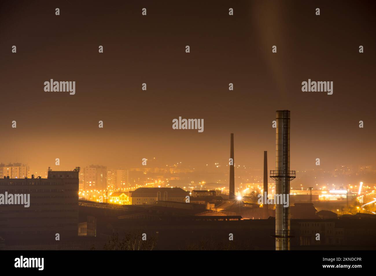 City and factory at night Stock Photo - Alamy