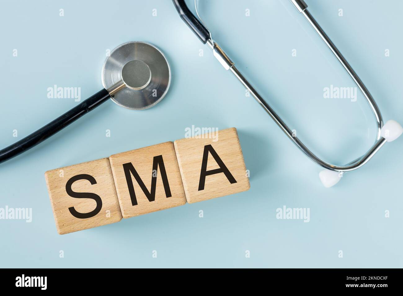 SMA, spinal muscular atrophy, Written on wooden blocks, a rare disease ...