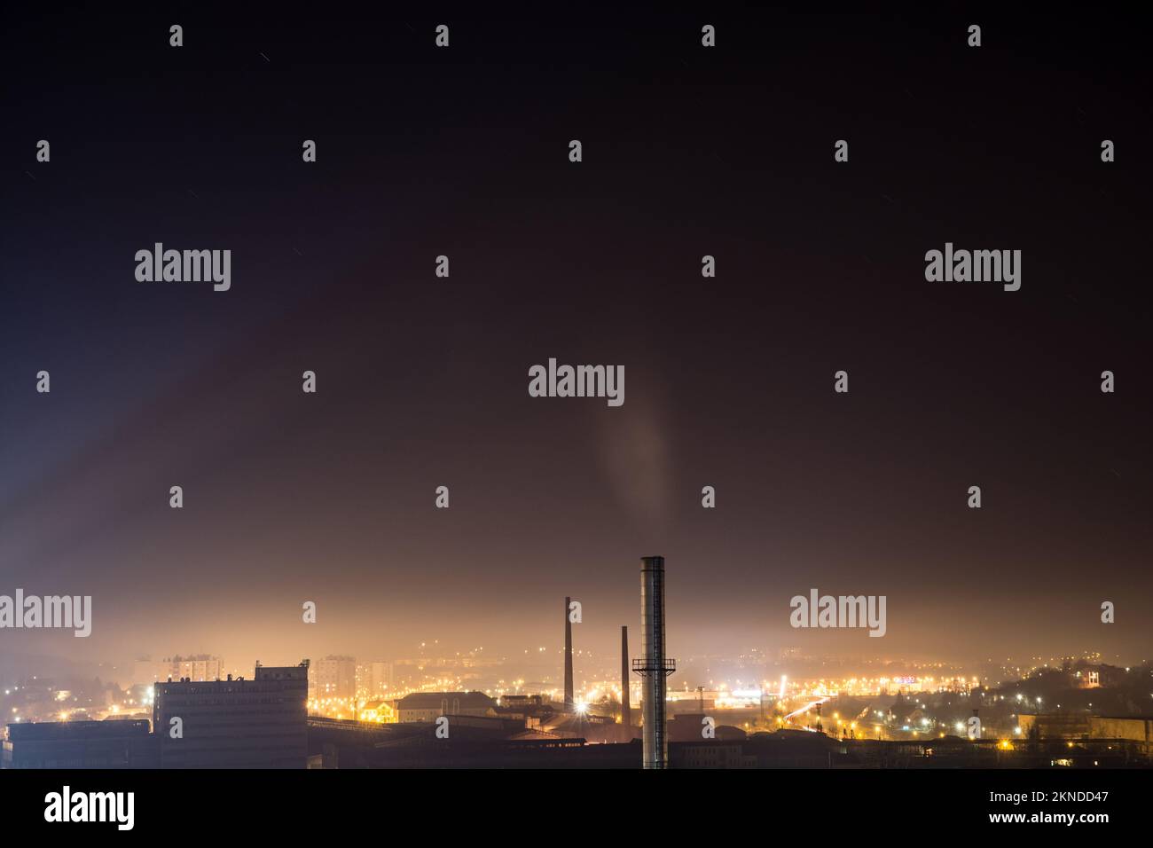 City and factory at night Stock Photo - Alamy
