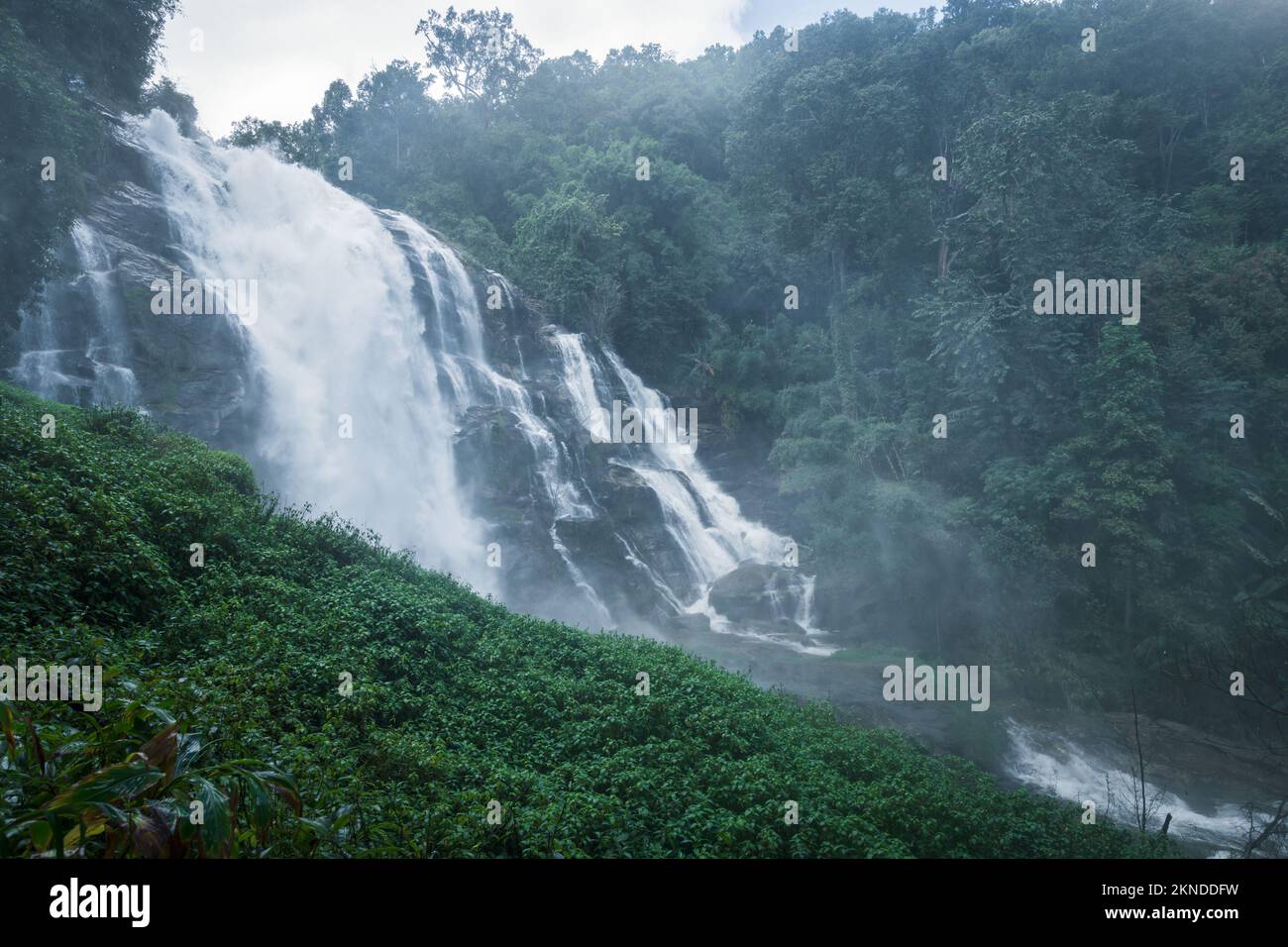 Strong flow with rain-like mist in the spray of Vachirathan Waterfall ...