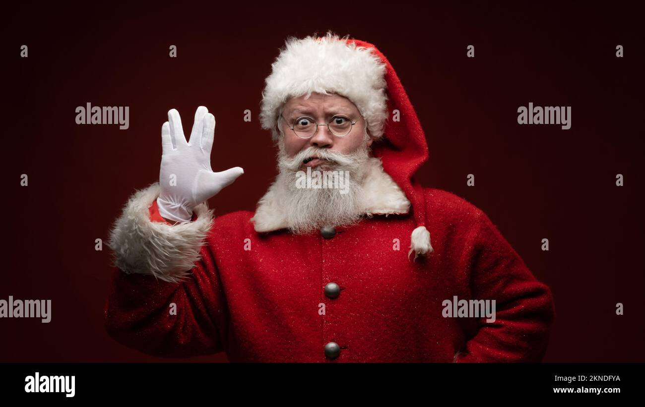 Santa Claus hand doing the Vulcan salute. Spock hand Stock Photo - Alamy