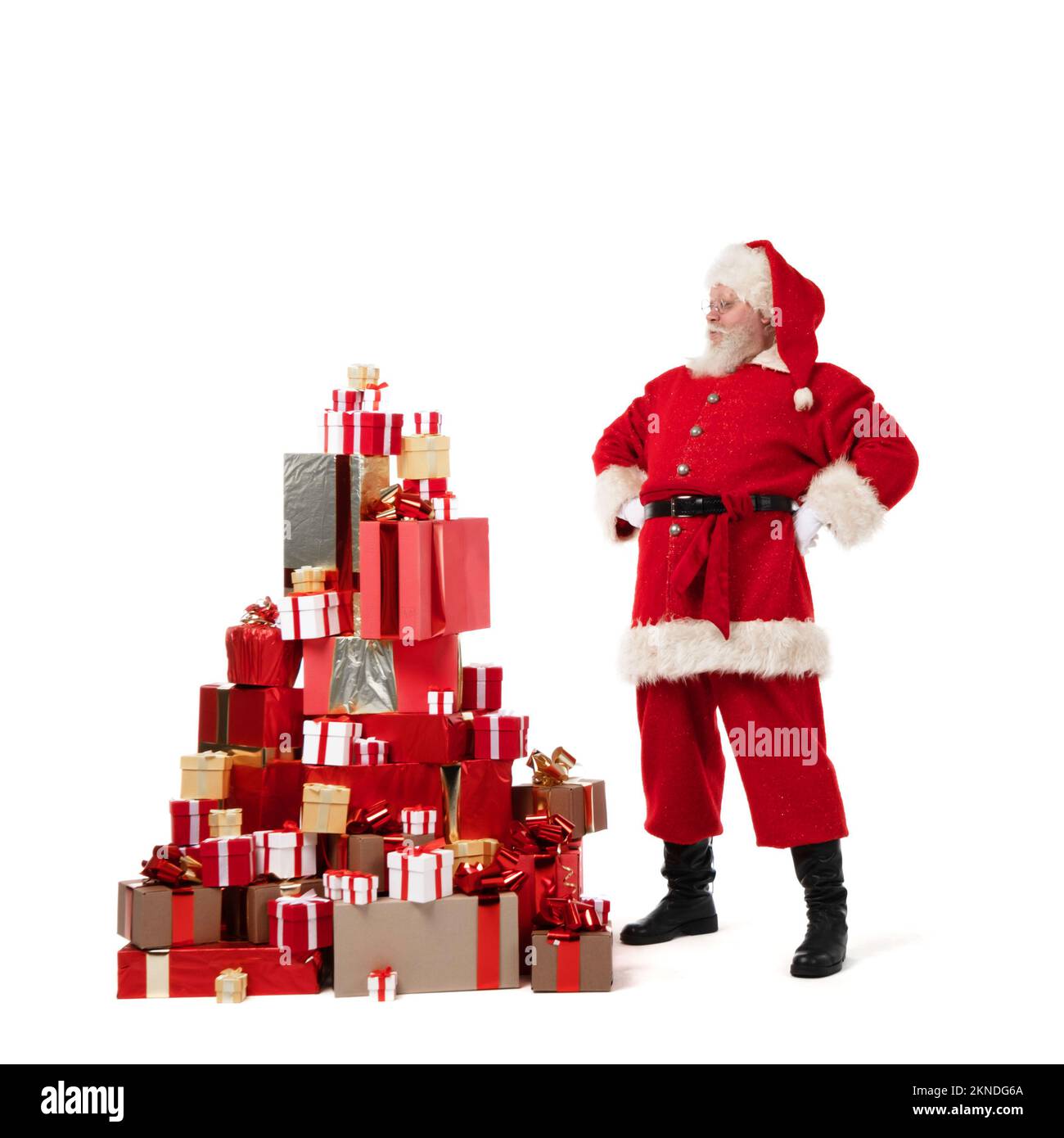 Santa Claus putting heap pile of gifts isolated on white background ...