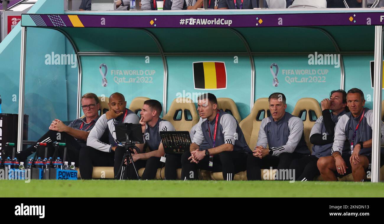 Doha, Qatar. 27th Nov, 2022. Thierry Henry assistant coach (2l) and the ...