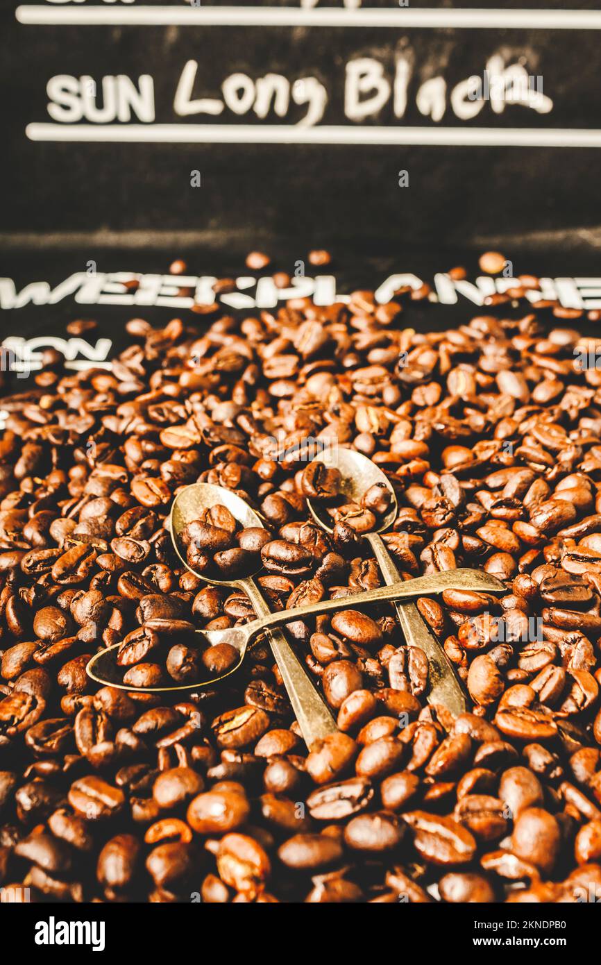 Old-fashioned still life art on a set of teaspoons serving up a hot ...