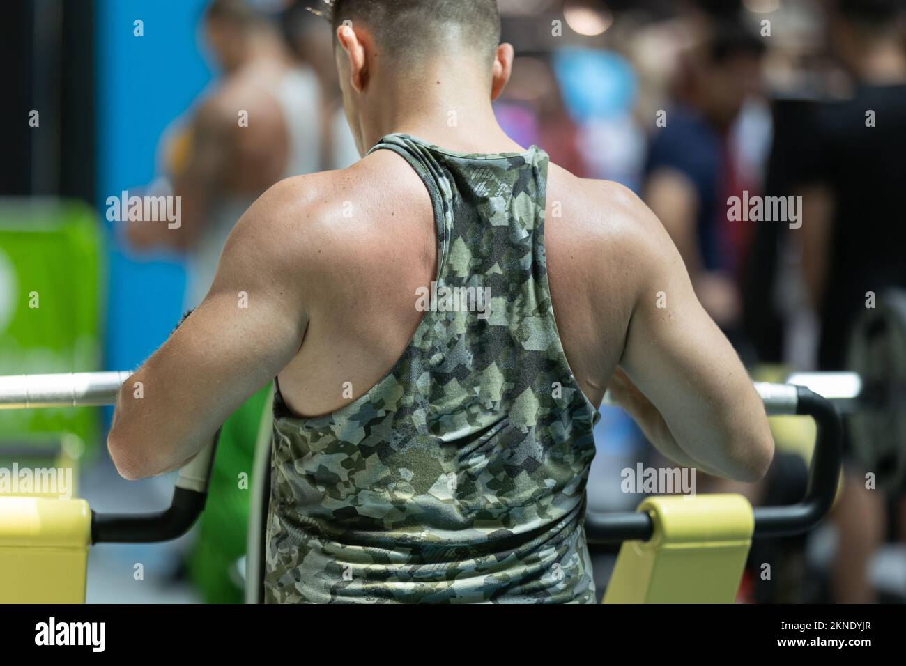 Fitness Workout: Boy doing Exercises in Class with Gym Equipment for ...
