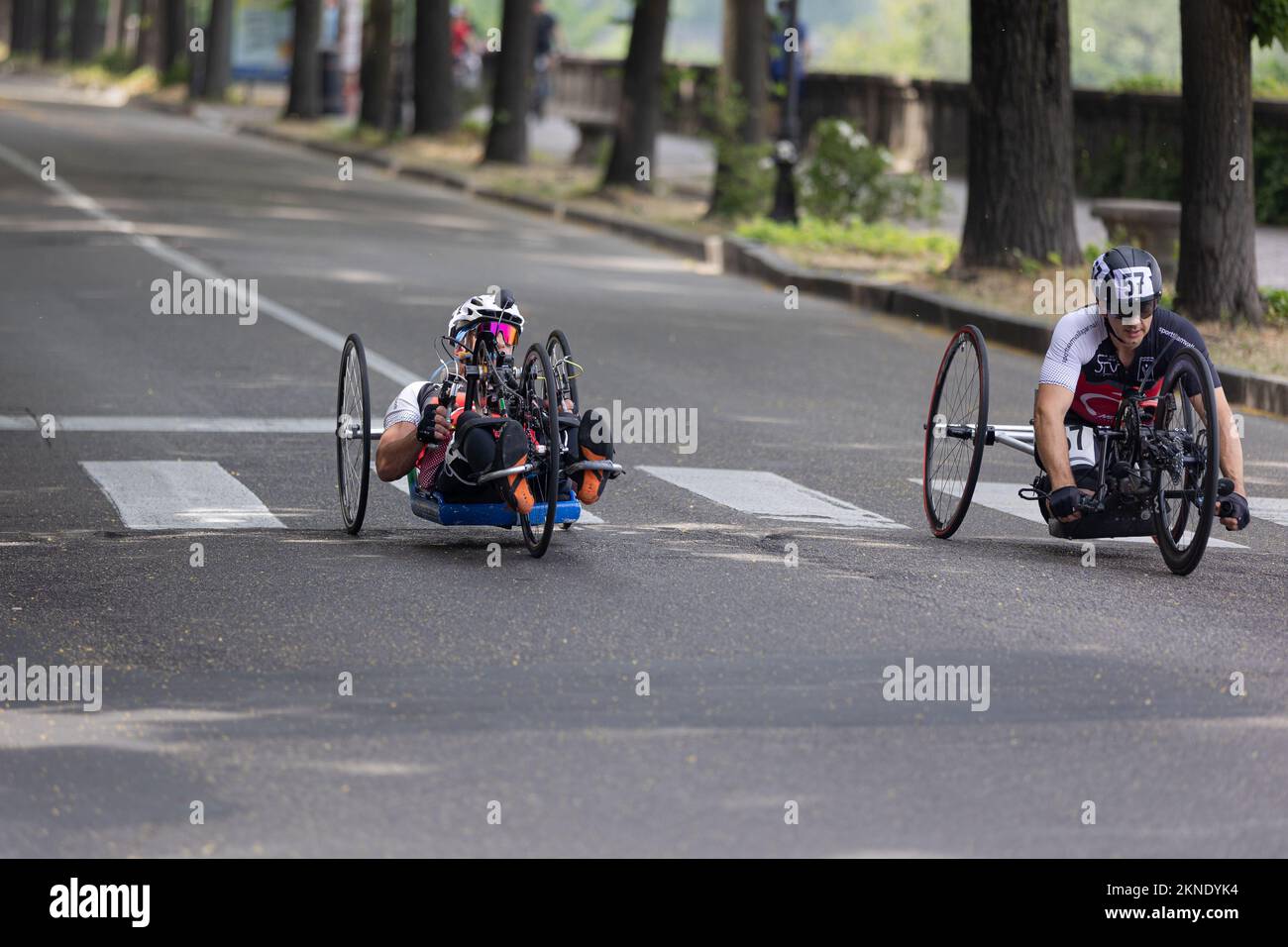 Couple of Athletes training with Their Special Bikes on a City Track ...