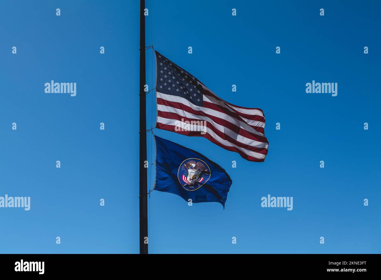 The flag of the United States and the state of Utah Stock Photo - Alamy