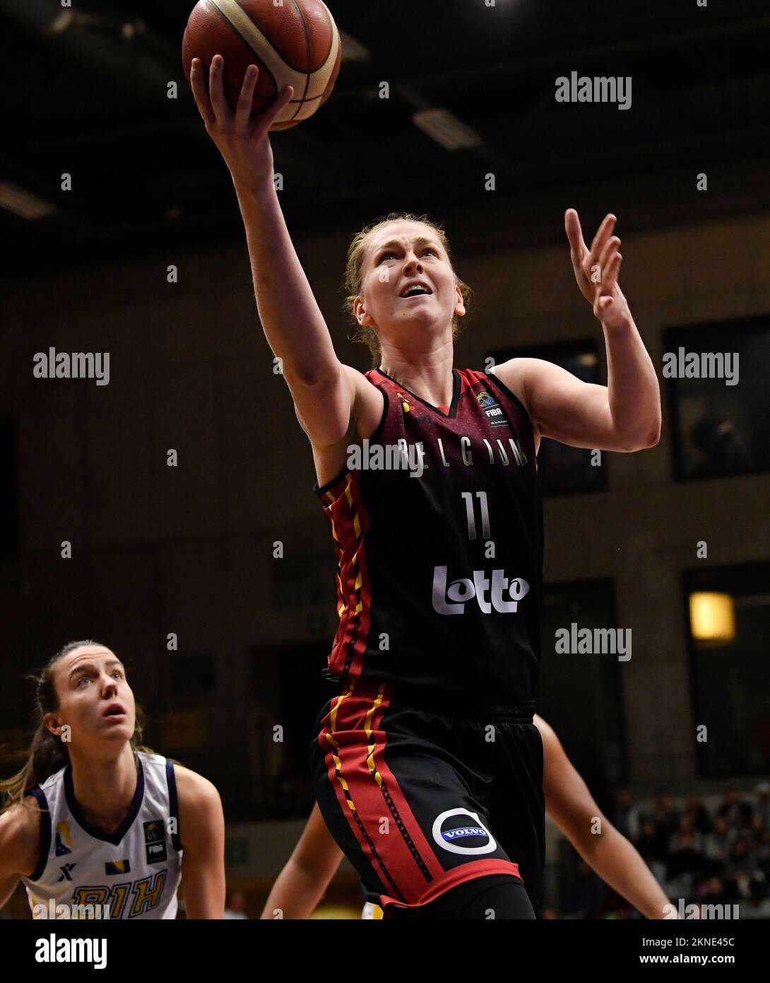 Belgium's Emma Meesseman and BiH's Milina Miseljic fight for the ball ...