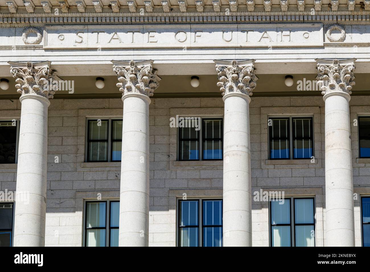 The architecture of buildings windows, stucco molding, and columns on a ...